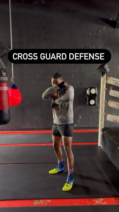 How to use the Cross Guard #boxing #boxer #boxingtips #boxingtraining - YouTube