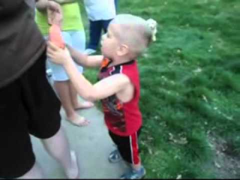 Little Boy Plays With Whoopee Cushon