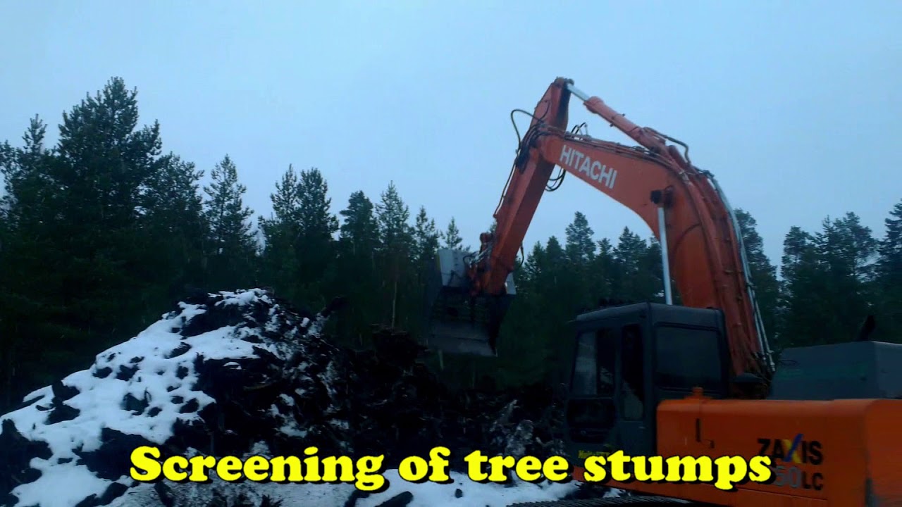 Screening of tree stumps with MultaVEX Vibra screening bucket - YouTube