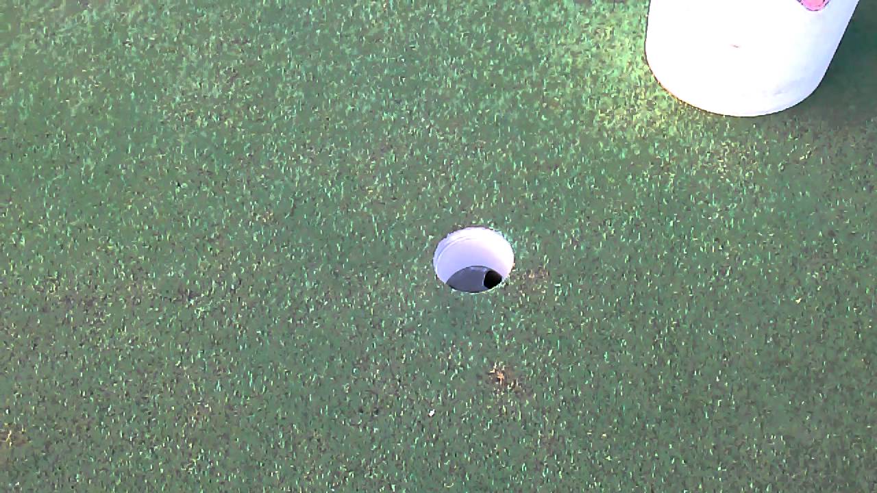 The correct way to cut a cup on a green - YouTube