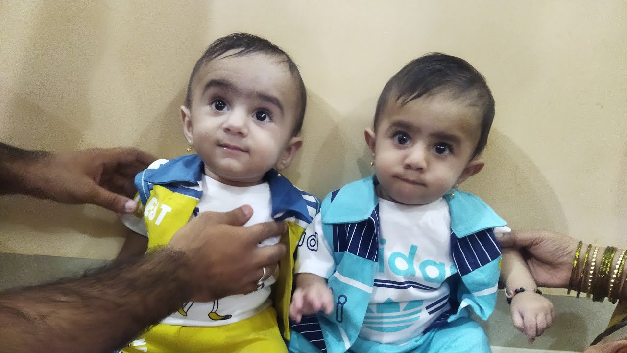 Baby trying to bite finger | Brother bites finger | Twins Babies - YouTube