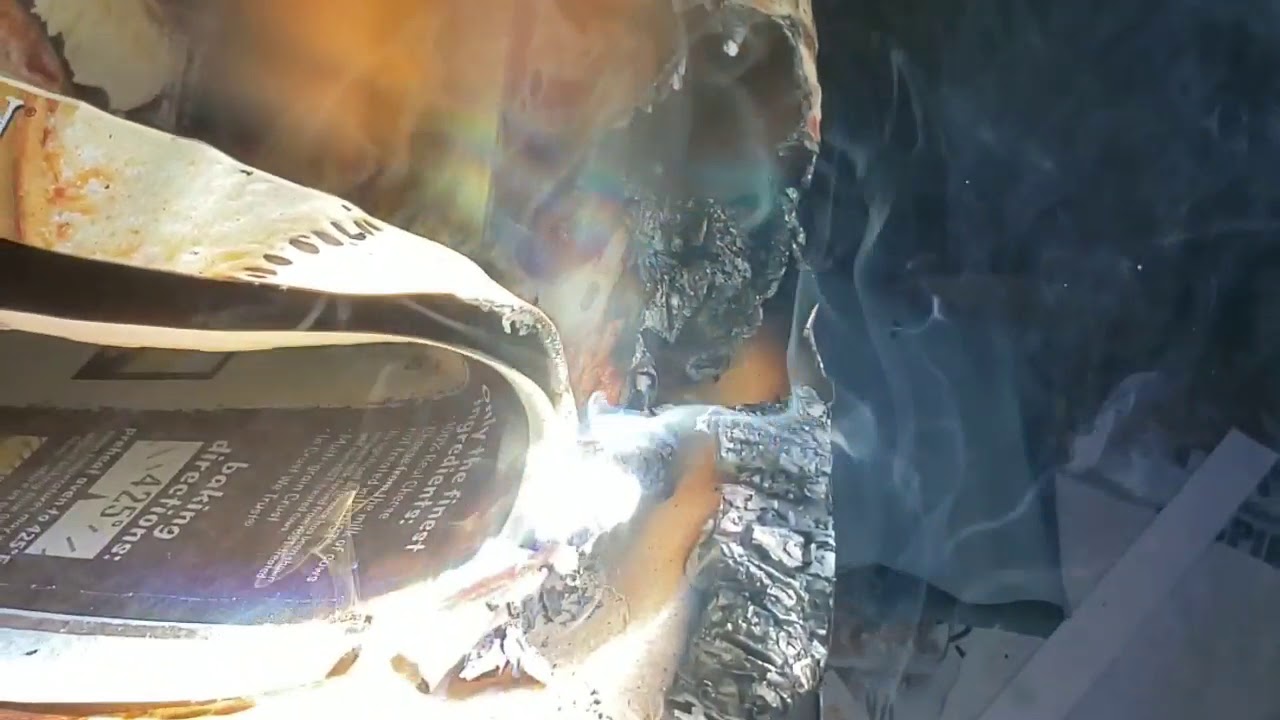 Magnify sunlight to make a burning laser! Powerful Fresnel lens - YouTube