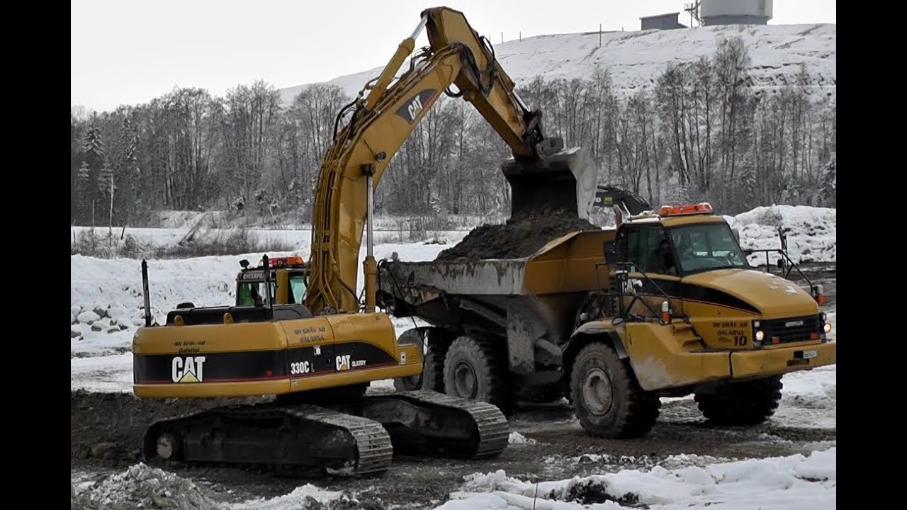 CAT 330CL Quarry Loading A CAT 740 Dumper - YouTube