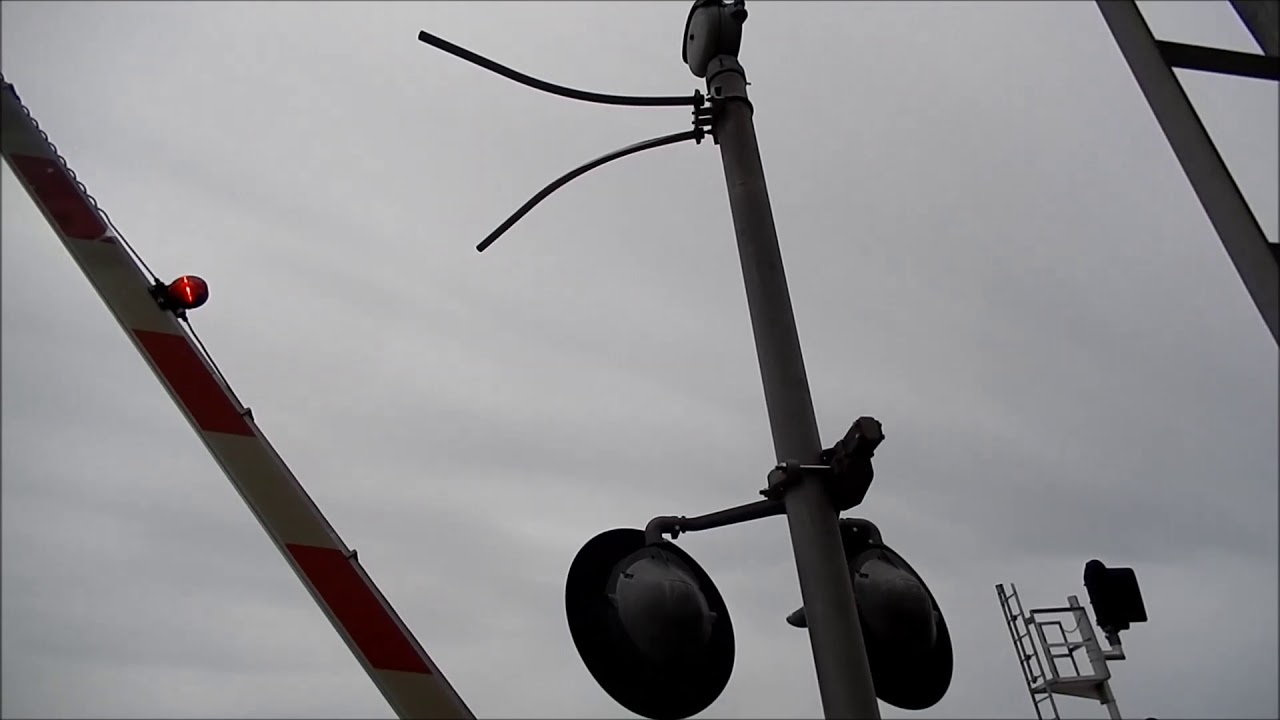 Amtrak train goes through crosing with vintage rare bells - YouTube