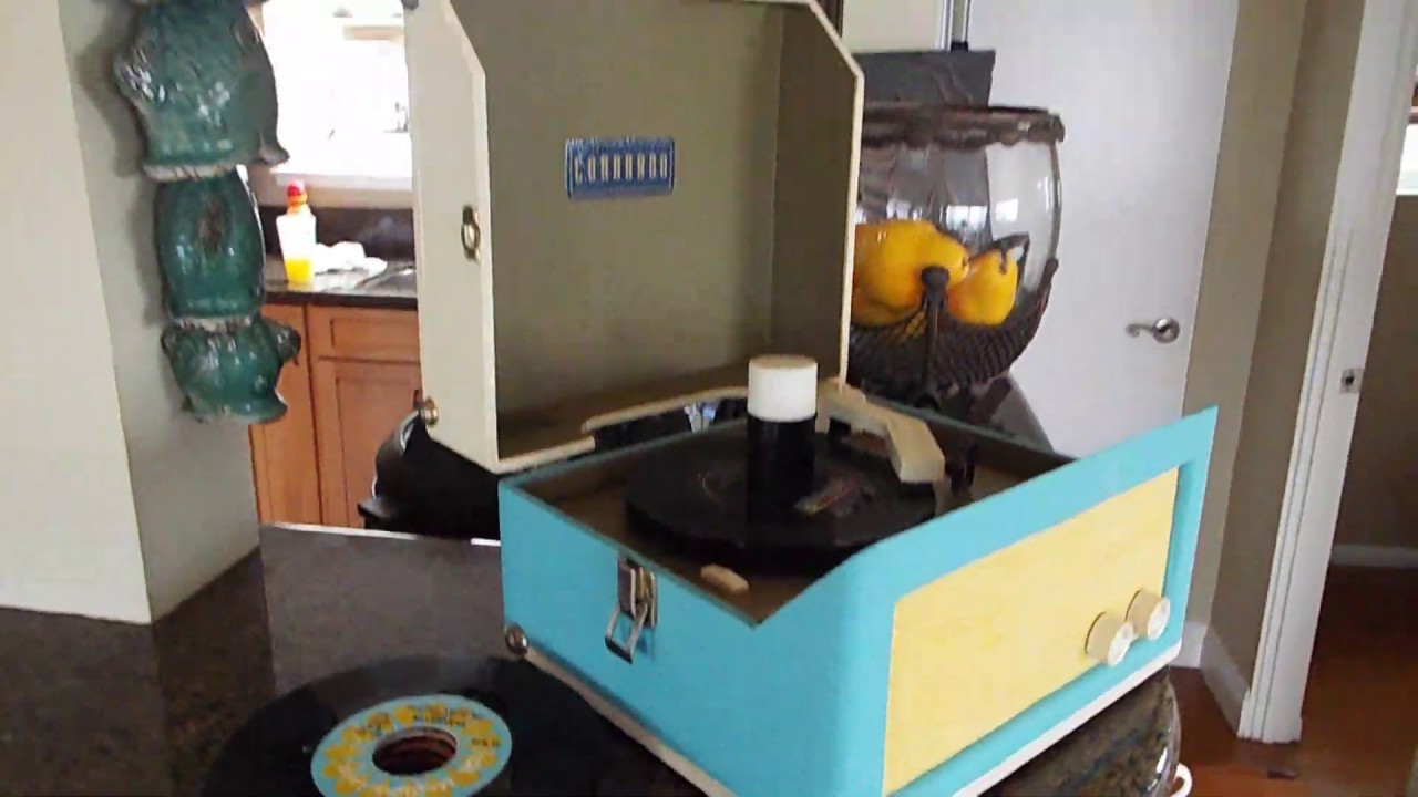 CORONADO 45 record player. RCA 45 changer playing a stack of records ...