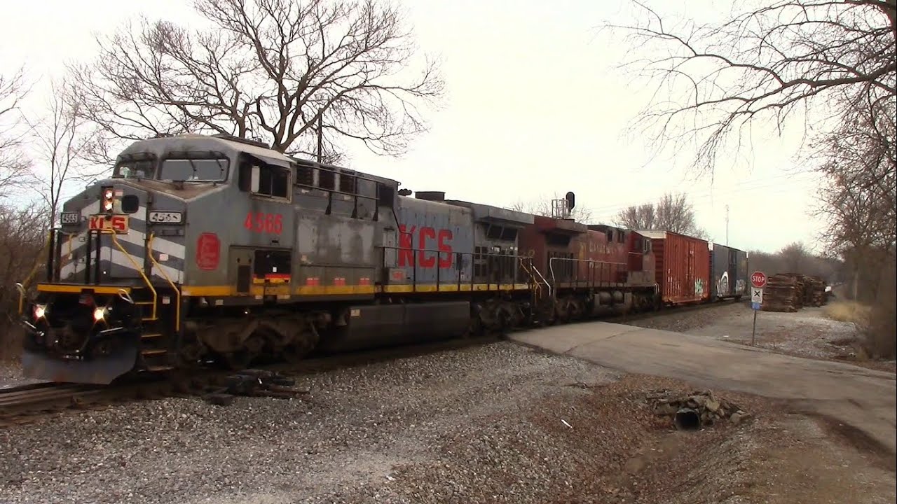 NS 181 (Left Side) with KCS 4565 (KCS Grey) and CP 8600 at the NS East Yard in Lafayette ...