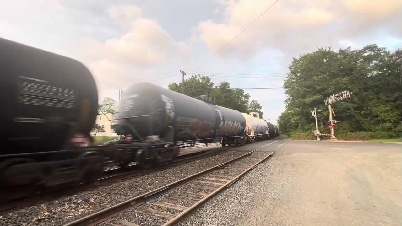 CSX 7241 CM44AC leads CSX M404 through Piscataway - YouTube