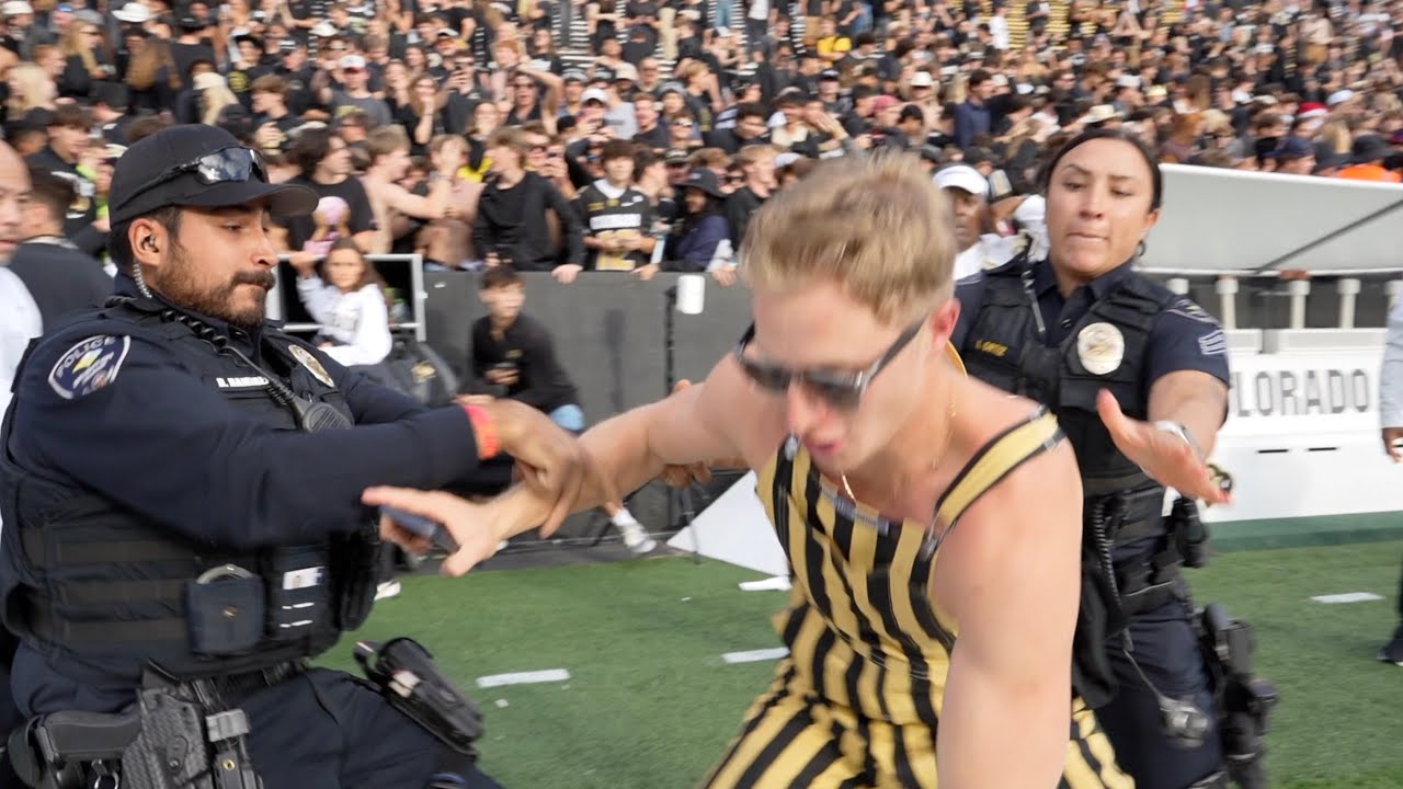Colorado Fan Escaped Two Police To Storm The Field! - YouTube