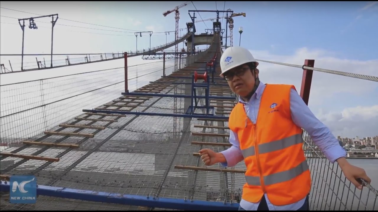 Africa's longest suspension bridge: Construction crews finish hanging ...