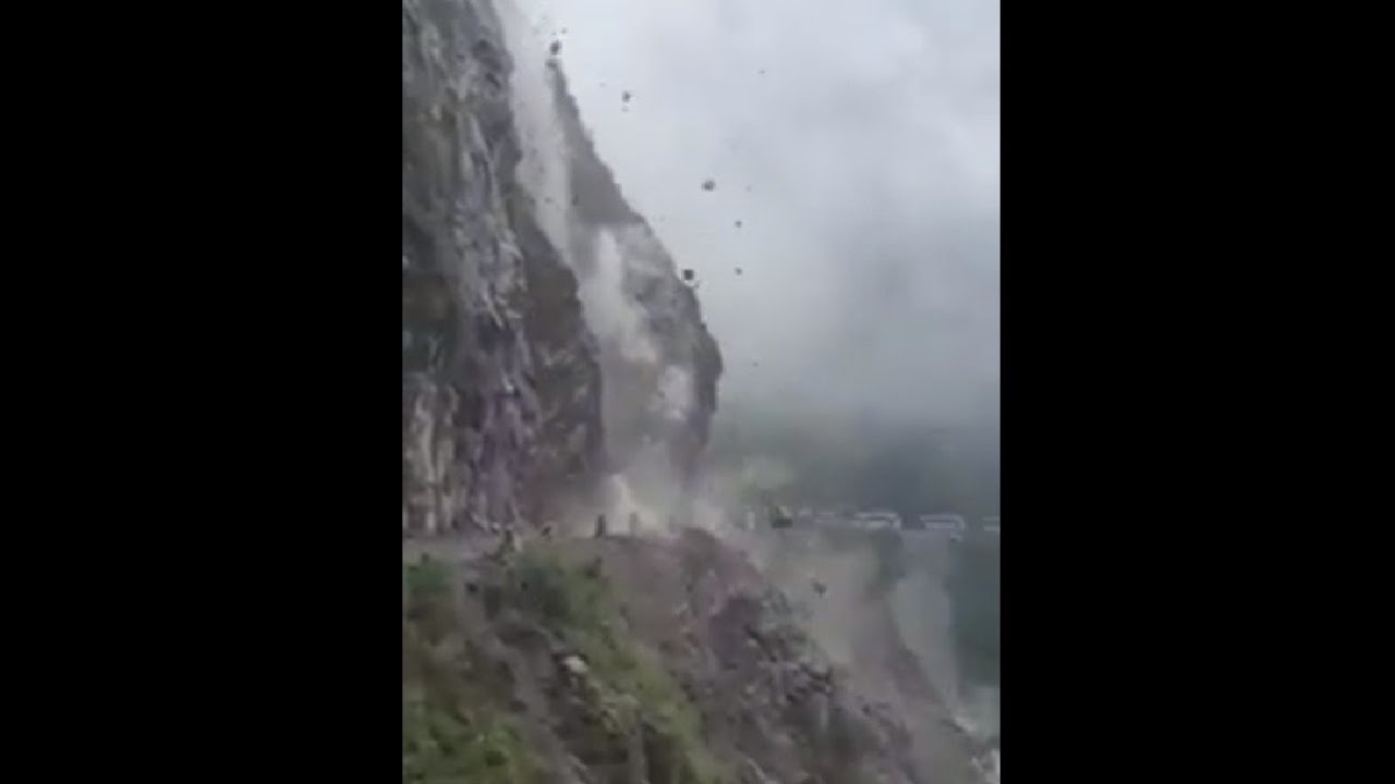Huge Rocks Falling Down A Mountain Into The Ocean - YouTube