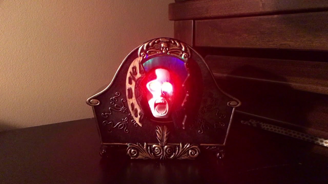 (NEW) Halloween 2017 Animated Haunted Face Out Clock From At Home - YouTube