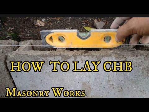 Masonry works(How to lay CHB) - YouTube