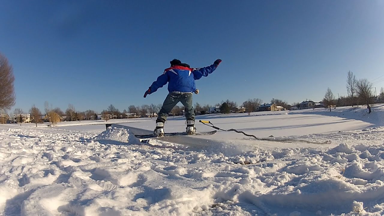 Backyard Snowboarding with a Banshee Bungee - GoPro at the lake - YouTube