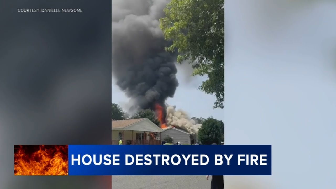 Large flames, loud booms caused by massive fire - YouTube