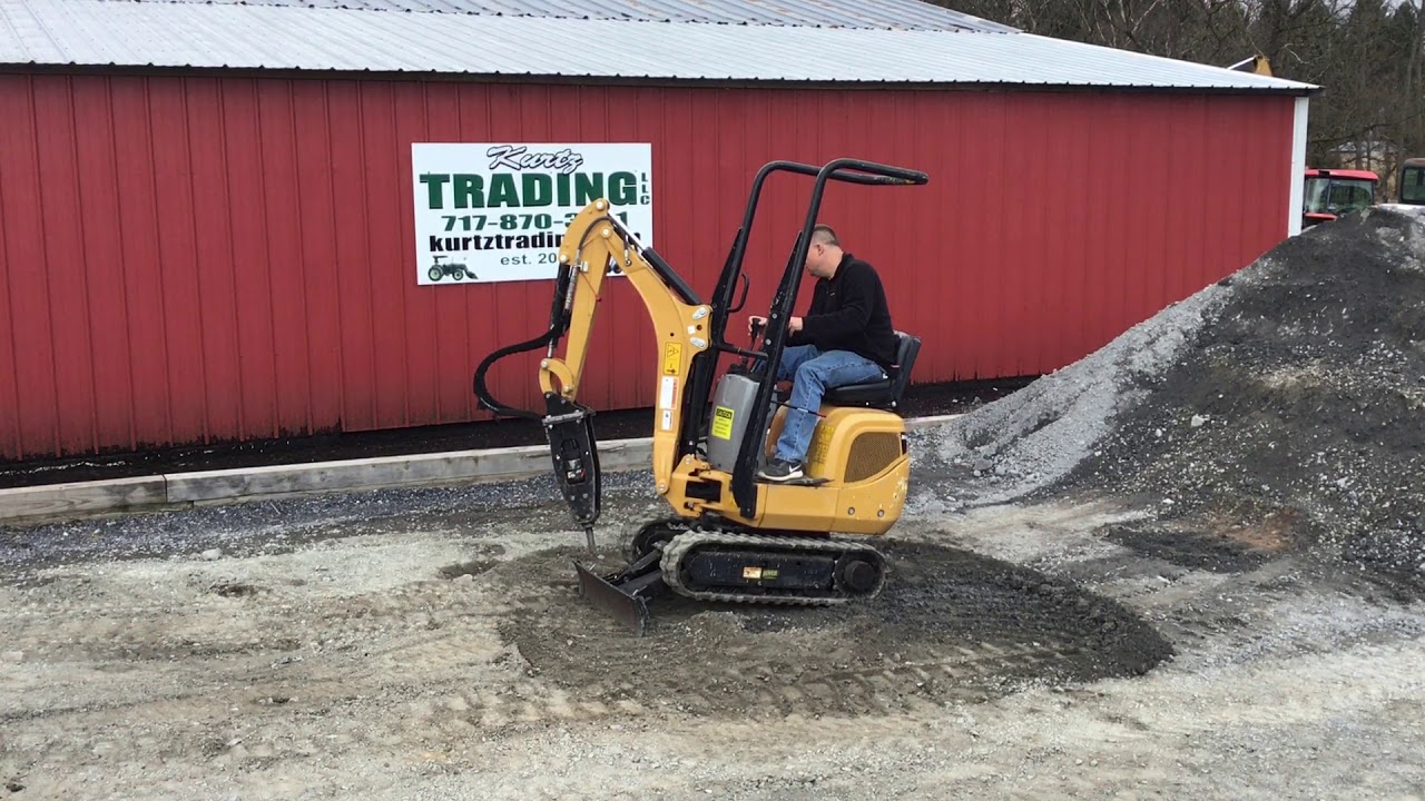 CATERPILLAR 300.9D EXCAVATOR - YouTube