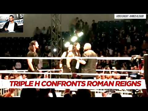 Triple h conforts roman regins in Abu Dhabi