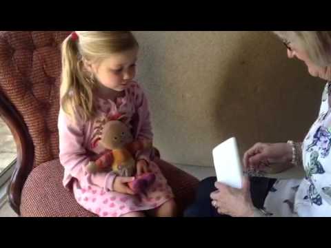Child testing her doll with Frisby Stereotest - YouTube