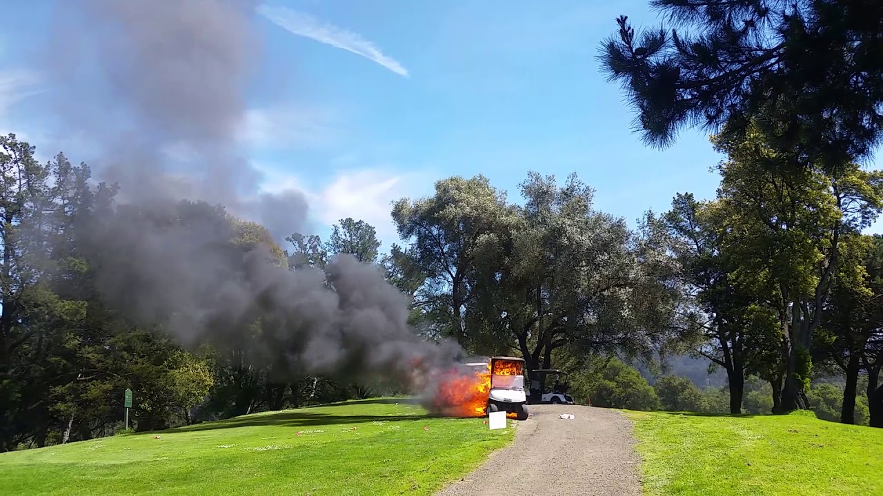 Golf cart on fire - YouTube