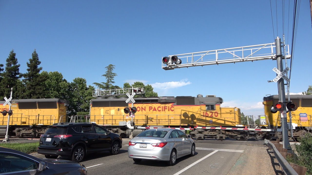 UP 9924 Rodgers Hauler With SD40N South, Calvine Rd. Railroad Crossing ...