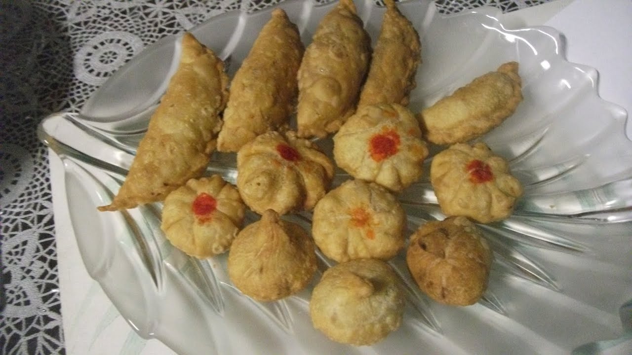 How to make fried coconut puli pitha - YouTube