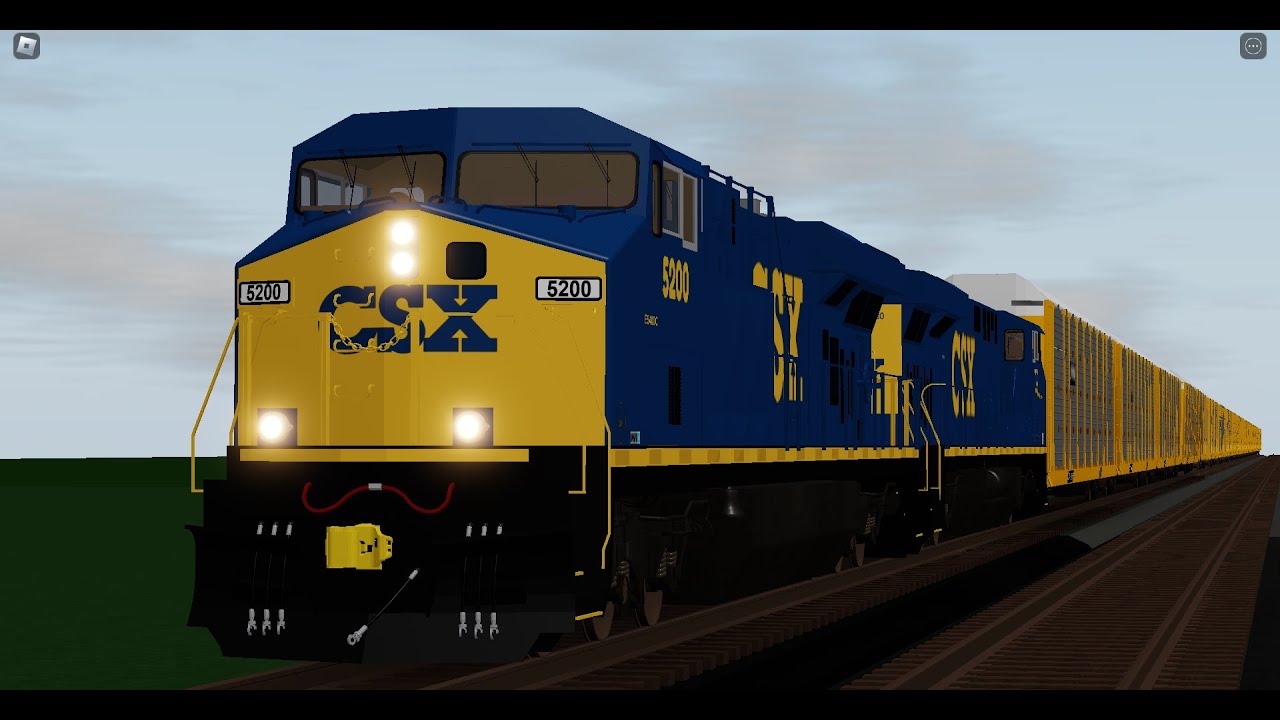 New CSX 5200 ES40DC Leads Autorack train - YouTube