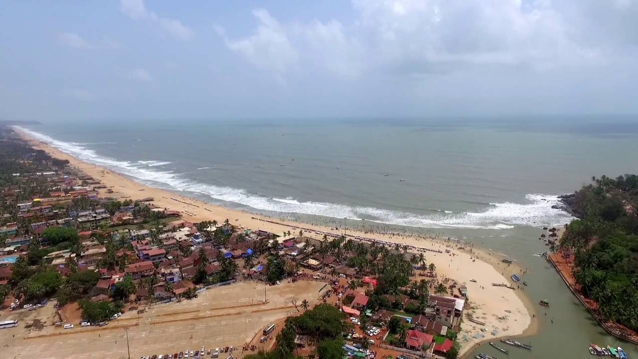 Baga-River meets the Indian Ocean at Baga Beach - YouTube