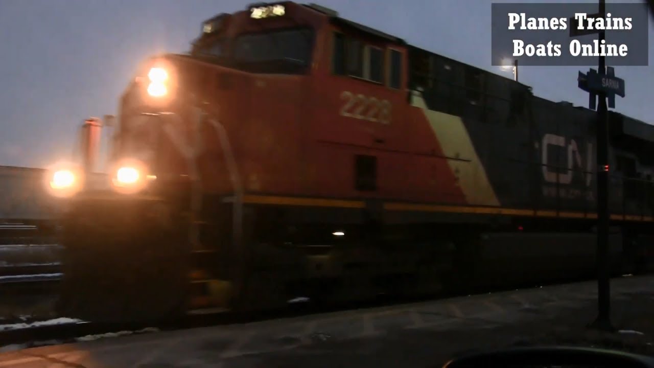 CN 2228 & CN 2550 Engines Manifest Train Eastbound From Michigan Tunnel ...