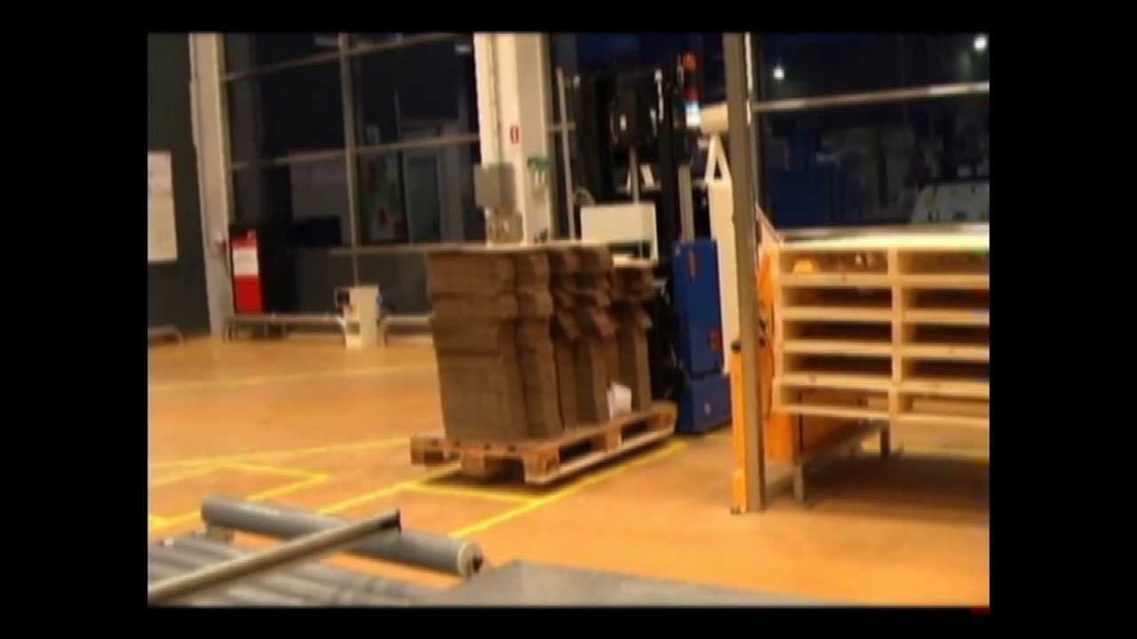 AGVs moving pallets - YouTube