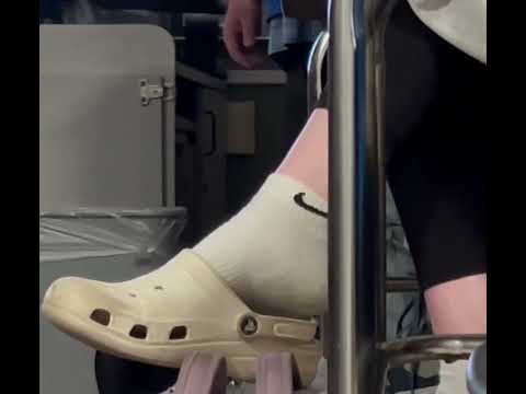 Dirty white socks shoe dangle