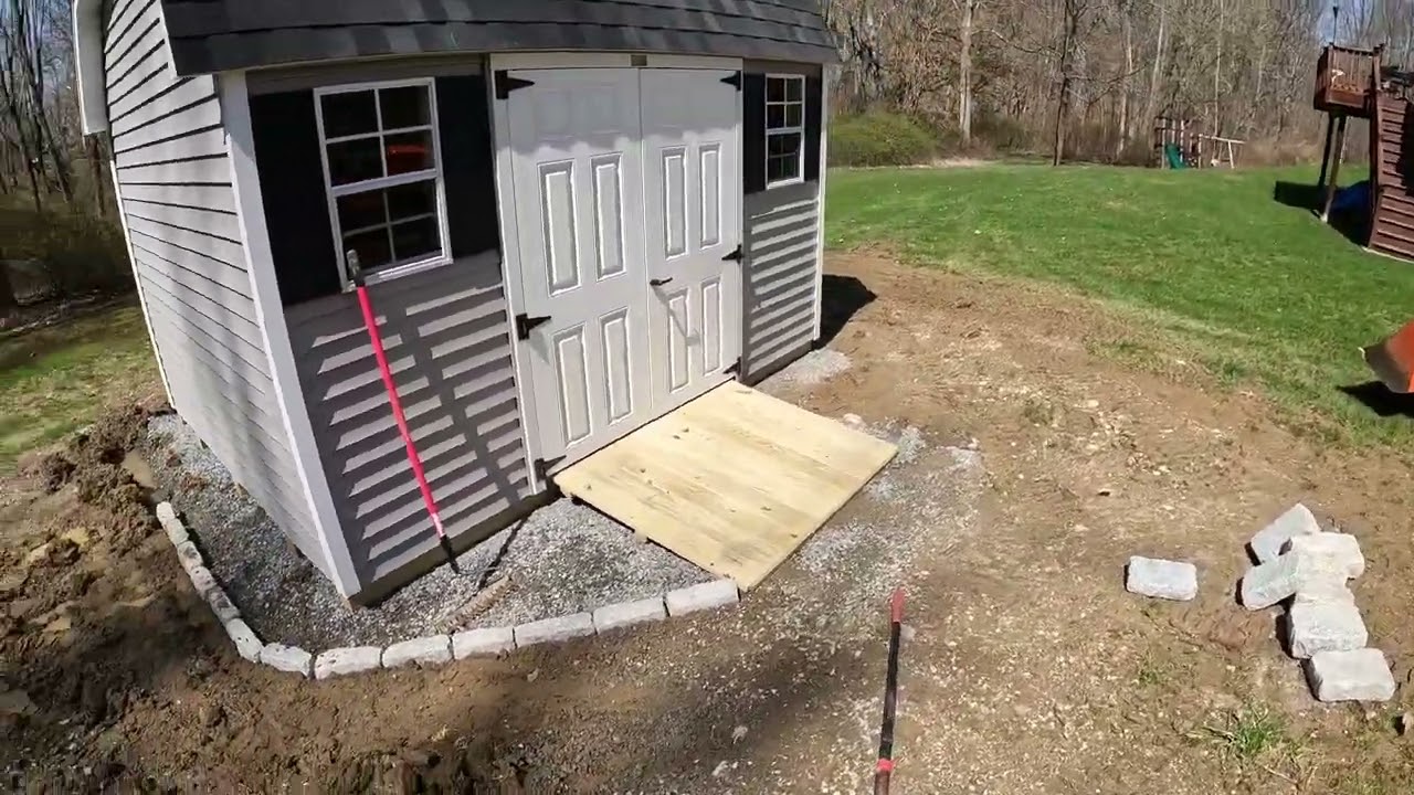 Belgian Block Install Around New Shed - YouTube