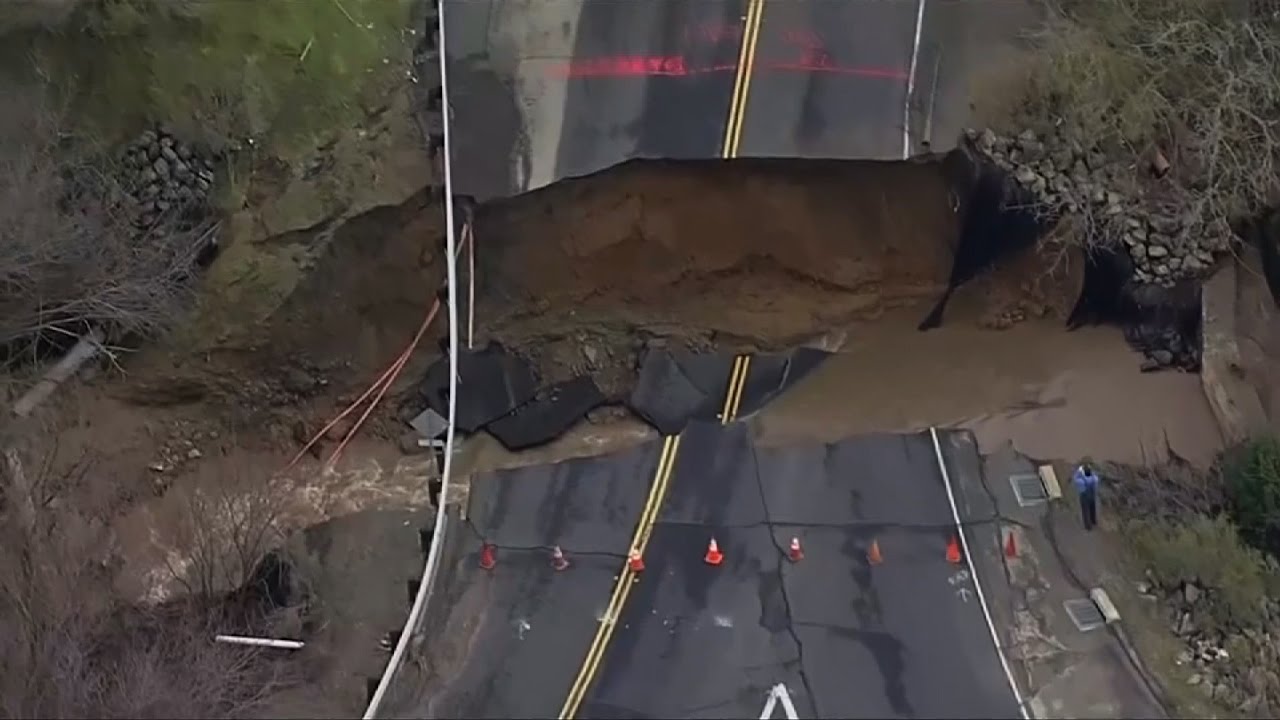Heavy Rainfall Causes Road Collapse In California - YouTube