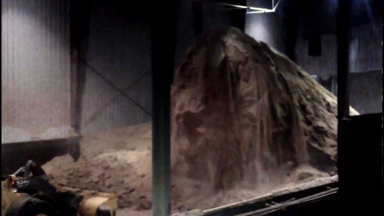 Front end loader feed pile collapse - YouTube