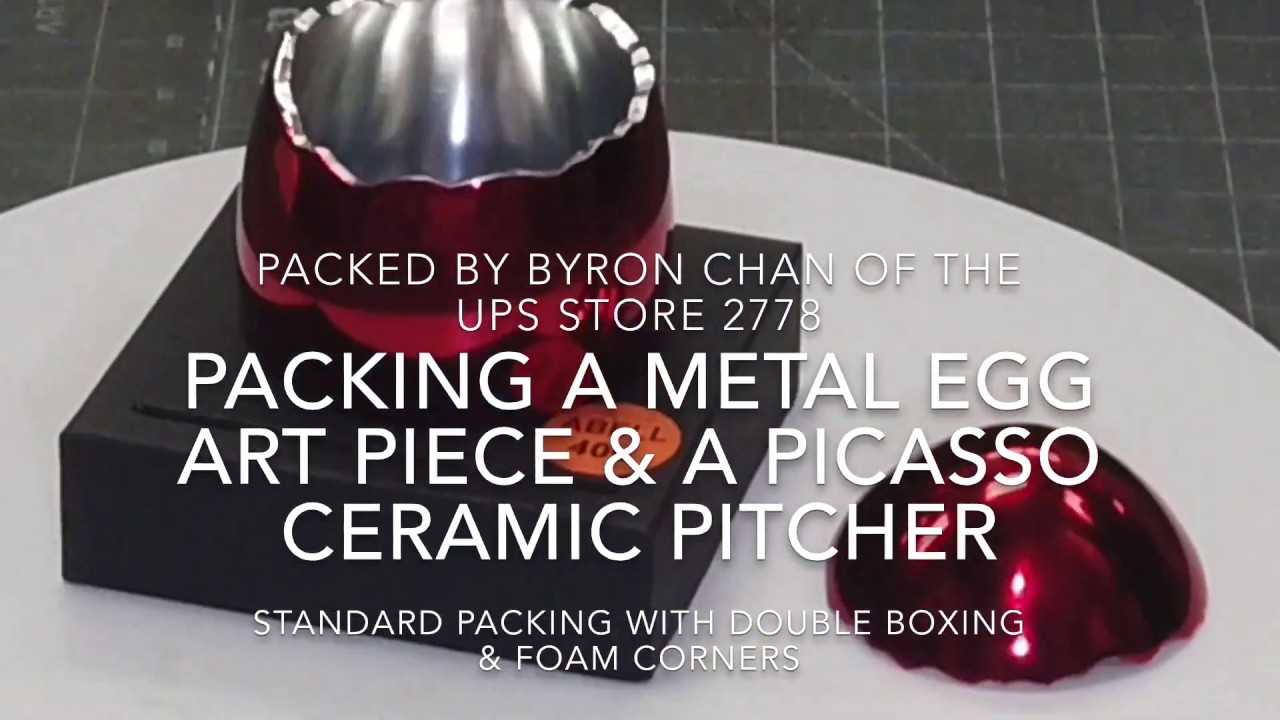 Packing a metal egg art piece and an antique Picasso pitcher - YouTube