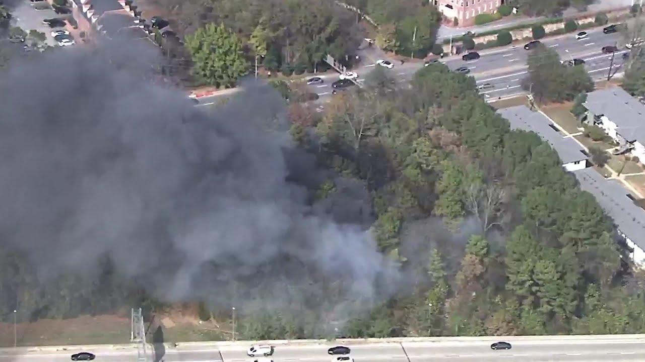RAW VIDEO: Large brush fire spotted near Buford Highway, causing smoke ...