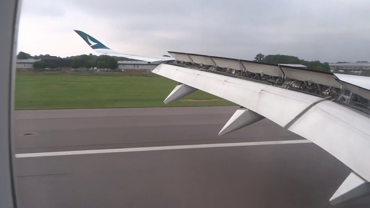 Cathay Pacific A350 window view landing LGW London Gatwick - YouTube