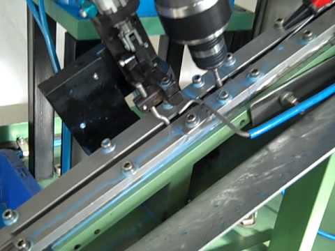 Elscint Automatic Tapping Machine with auto feeding from a Elscint Vibratory bowl feeder Model ...