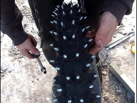 STUDDING A DIRT BIKE FRONT TIRE / HOW TO MAKE WINTER TIRES FOR SNOW AND ...