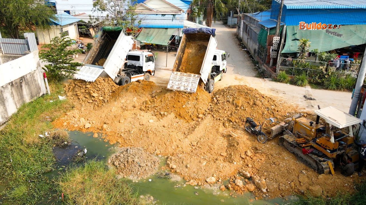 First Starting New project Showing Bulldozer pushing soil Delete sludge ...