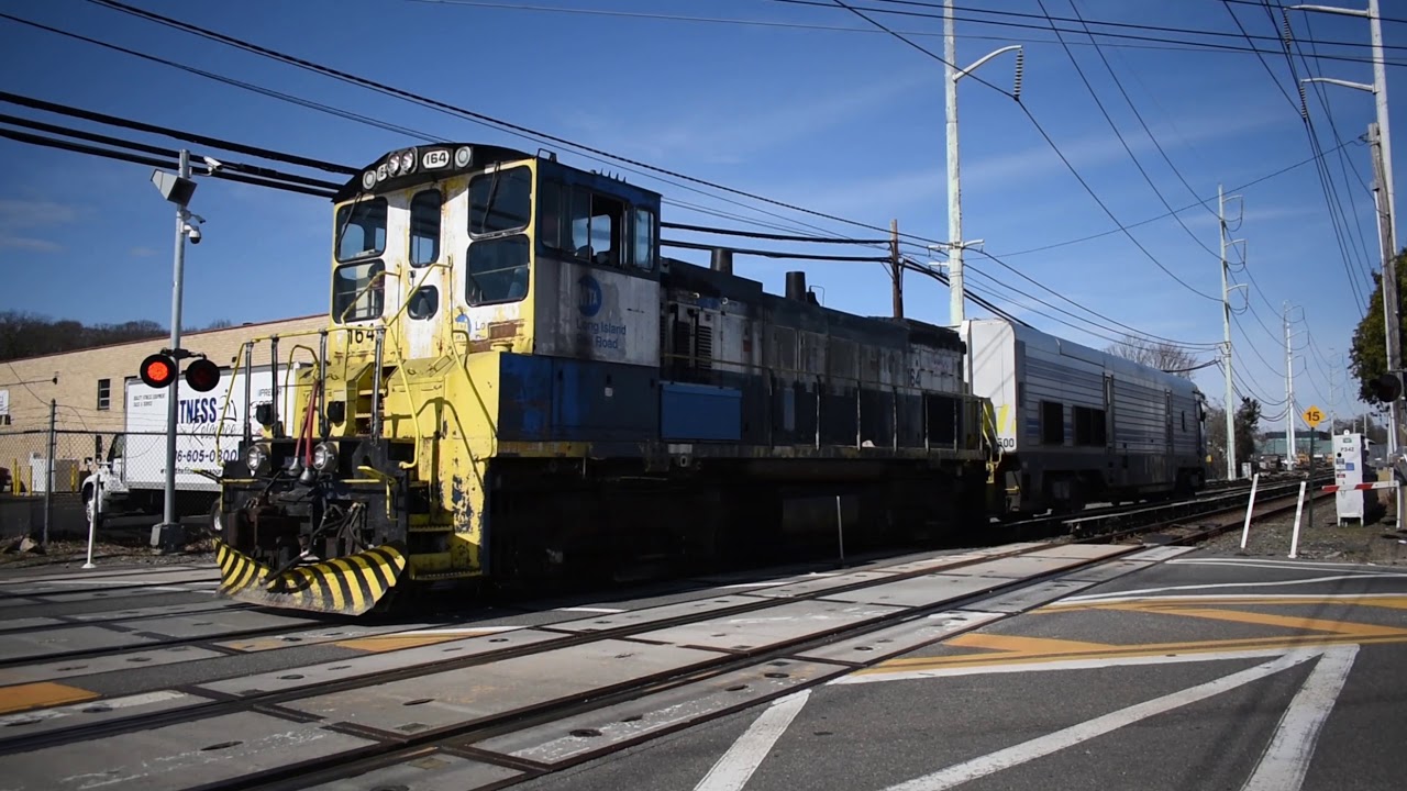 LIRR MP15AC #164 Tows DM30AC #500 - YouTube