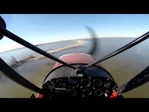 PA-18 Super Cub landing on a sand bar (4K)