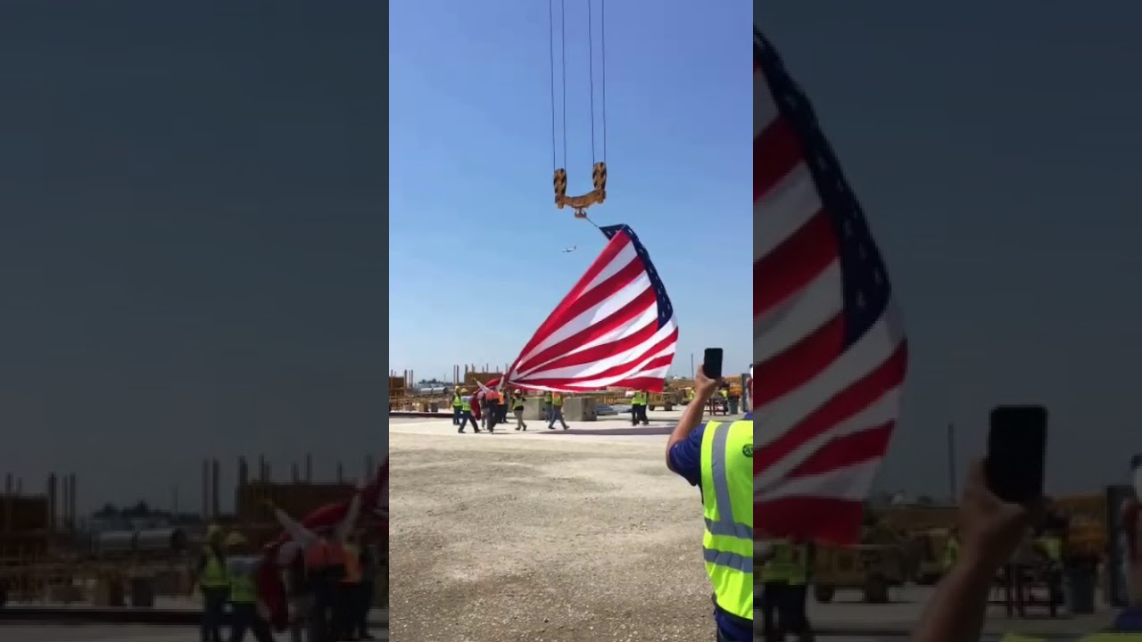 Crane Raises American Flag - YouTube