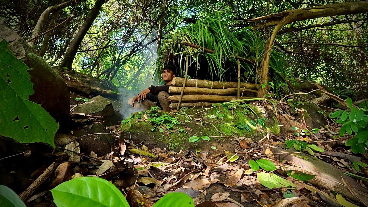 Building a shelter for camp alone and eat just only what the nature ...