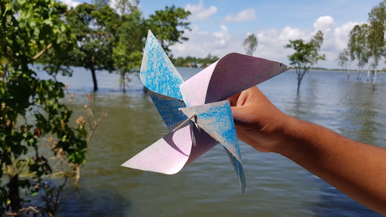 Handmade paper pinwheel is moving or spinning at natural wind - YouTube