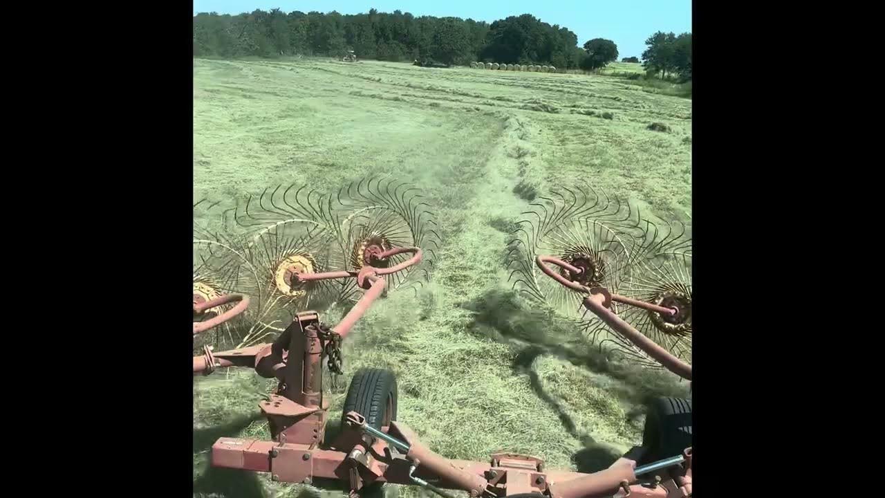 Raking 2nd cutting grass hay - YouTube