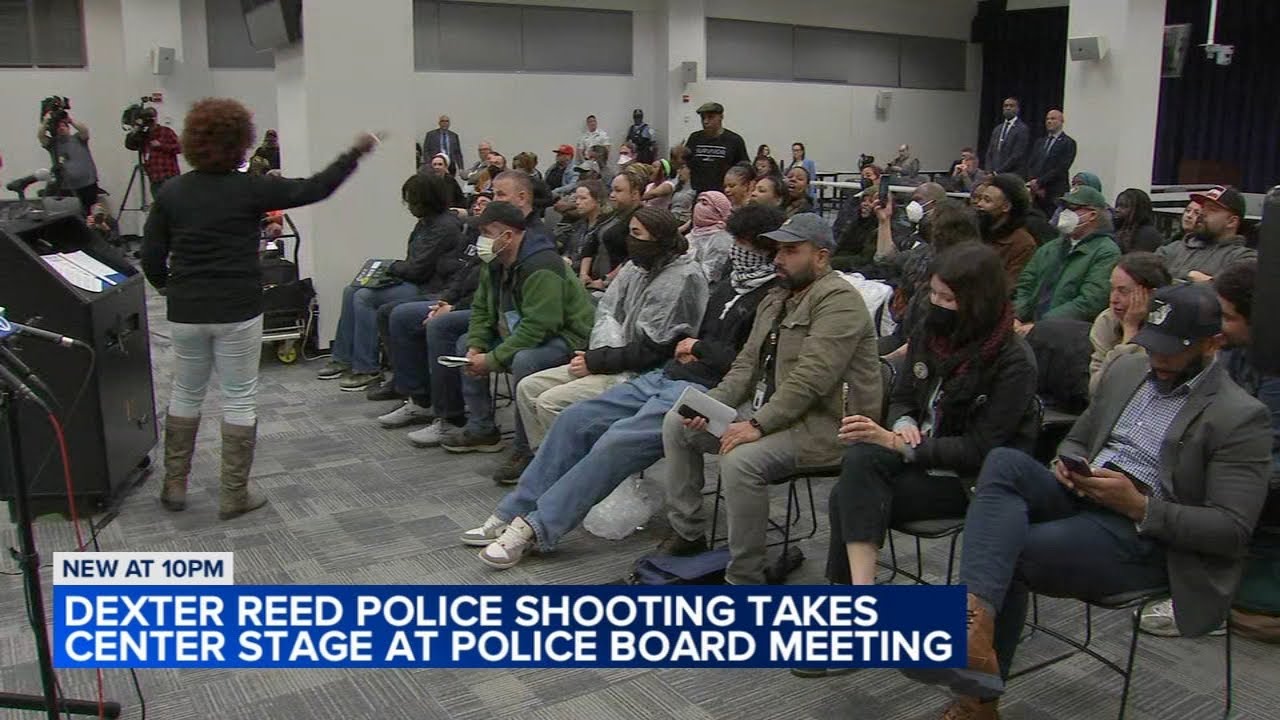 Protesters take fury at Dexter Reed shooting to CPD board meeting - YouTube
