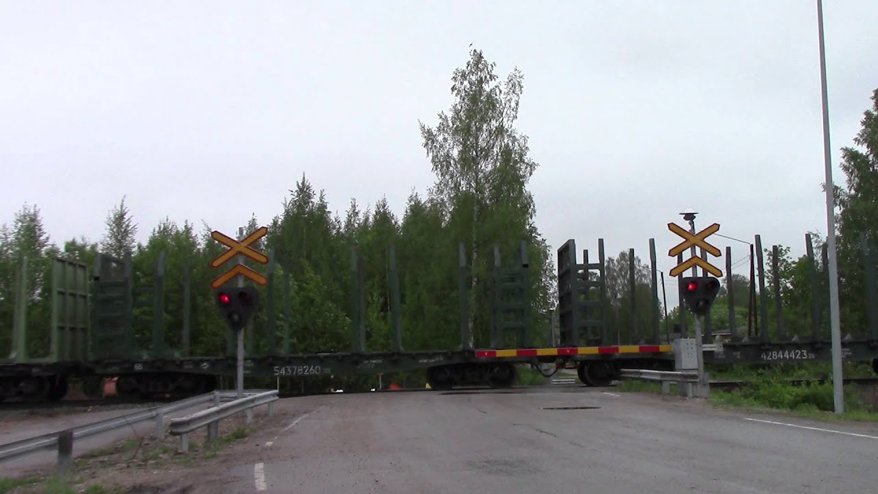 Russian freight train passed KYYRÖNKOSKI (Km. 0332+0812) level crossing ...