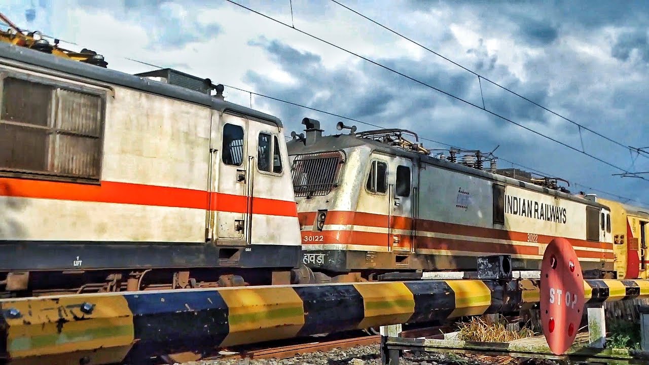 #railgate : Busy rail gate | WAP-7 & WAP-5 intercity crossing level ...
