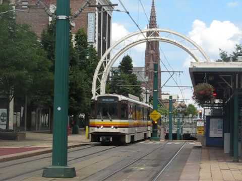 a light rail train at the Main Street portal in downtown Buffalo - YouTube
