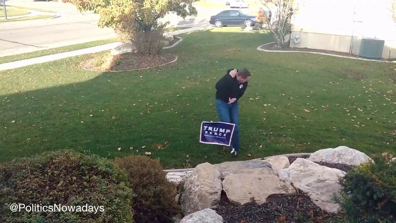 ‪Man tries to steal electric Trump lawn sign and receives instant ...