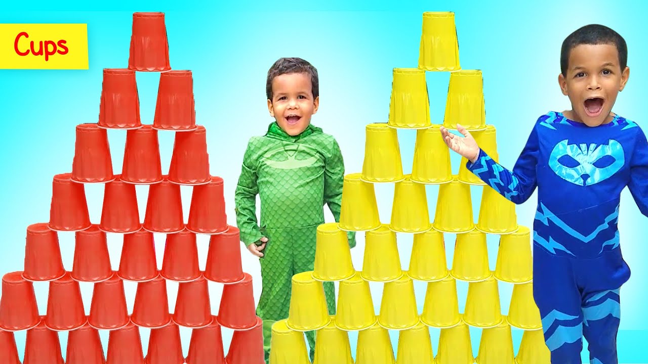Kids stack colorful cups pyramid to learn colors - YouTube